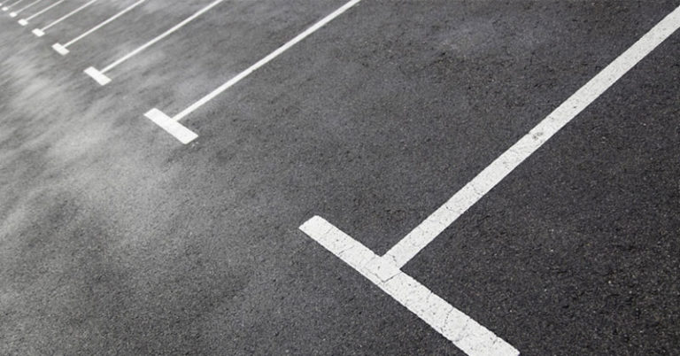 Remove Unwanted Lines From A Parking Lot Contractor s Asphalt